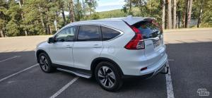 White Honda CR-V 2016 in Pabrade, with an engine capacity of 1.60 L and mileage of 255 thousand km for 12600 €, photo 8 on AUTOMOTO.COM.LV