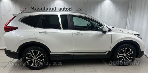 White Honda CR-V 2023 in Tallinn, with an engine capacity of 2.00 L and mileage of 55 thousand km for 29400 €, photo 5 on AUTOMOTO.COM.LV