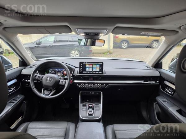 White Honda CR-V 2024 in Riga, with an engine capacity of 2.00 L and mileage of 13 thousand km for 42000 €, photo 6 on AUTOMOTO.COM.LV