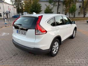 White Honda CR-V 2014 in Riga, with an engine capacity of 1.60 L and mileage of 245 thousand km for 6500 €, photo 4 on AUTOMOTO.COM.LV
