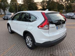 White Honda CR-V 2014 in Riga, with an engine capacity of 1.60 L and mileage of 245 thousand km for 6500 €, photo 5 on AUTOMOTO.COM.LV