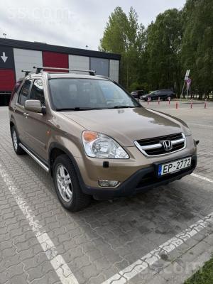 Yellow Honda CR-V 2002 in Riga, with an engine capacity of 2.00 L and mileage of 187 thousand km for 2400 €, photo  on AUTOMOTO.COM.LV