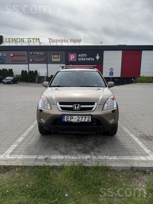Yellow Honda CR-V 2002 in Riga, with an engine capacity of 2.00 L and mileage of 187 thousand km for 2400 €, photo 3 on AUTOMOTO.COM.LV