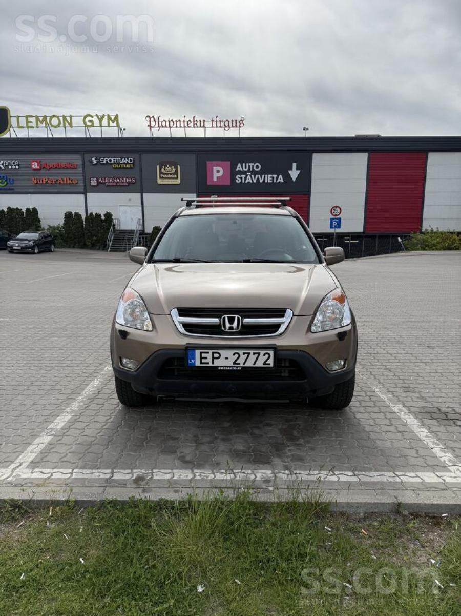 Yellow Honda CR-V 2002 in Riga, with an engine capacity of 2.00 L and mileage of 187 thousand km for 2400 €, photo 3 on AUTOMOTO.COM.LV
