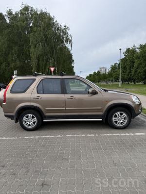 Yellow Honda CR-V 2002 in Riga, with an engine capacity of 2.00 L and mileage of 187 thousand km for 2400 €, photo 4 on AUTOMOTO.COM.LV