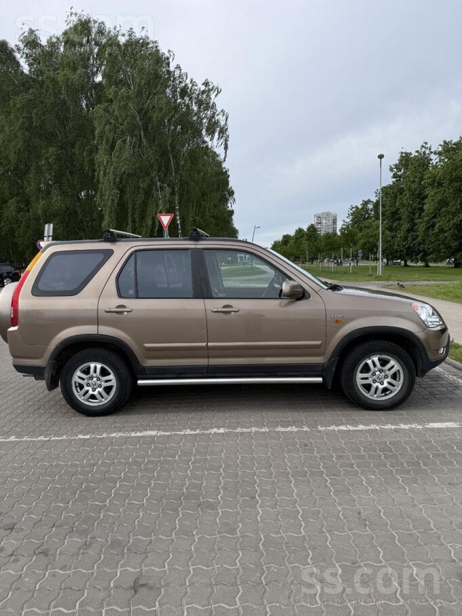 Yellow Honda CR-V 2002 in Riga, with an engine capacity of 2.00 L and mileage of 187 thousand km for 2400 €, photo 4 on AUTOMOTO.COM.LV