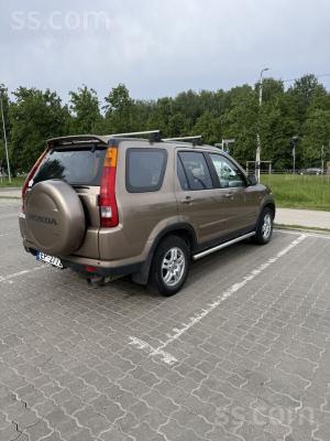 Yellow Honda CR-V 2002 in Riga, with an engine capacity of 2.00 L and mileage of 187 thousand km for 2400 €, photo 5 on AUTOMOTO.COM.LV