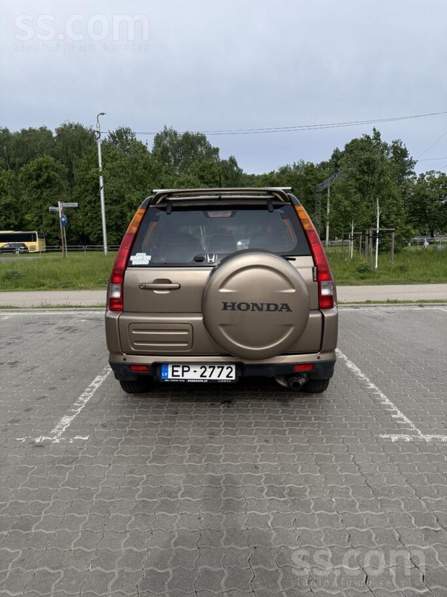 Yellow Honda CR-V 2002 in Riga, with an engine capacity of 2.00 L and mileage of 187 thousand km for 2400 €, photo 6 on AUTOMOTO.COM.LV