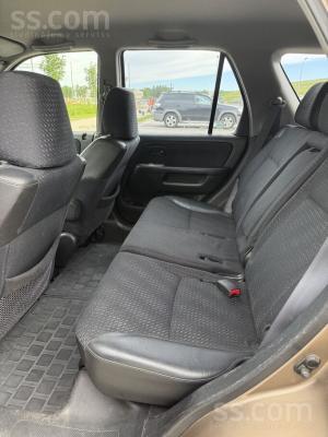 Yellow Honda CR-V 2002 in Riga, with an engine capacity of 2.00 L and mileage of 187 thousand km for 2400 €, photo 9 on AUTOMOTO.COM.LV