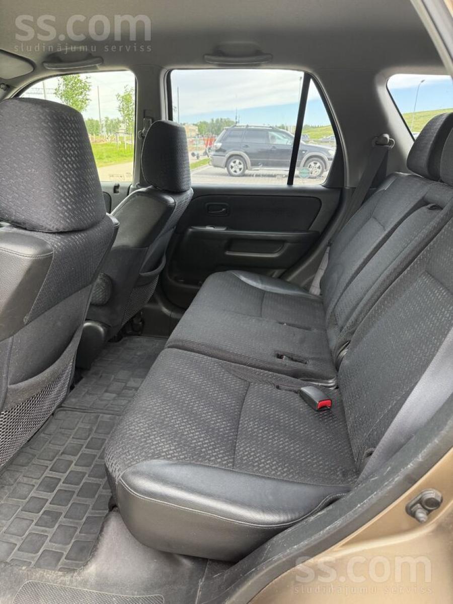 Yellow Honda CR-V 2002 in Riga, with an engine capacity of 2.00 L and mileage of 187 thousand km for 2400 €, photo 9 on AUTOMOTO.COM.LV