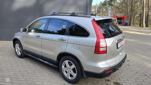 Yellow Honda CR-V 2007 in Alytus, with an engine capacity of 2.00 L and mileage of 282 thousand km for 4850 €, photo 2 on AUTOMOTO.COM.LV