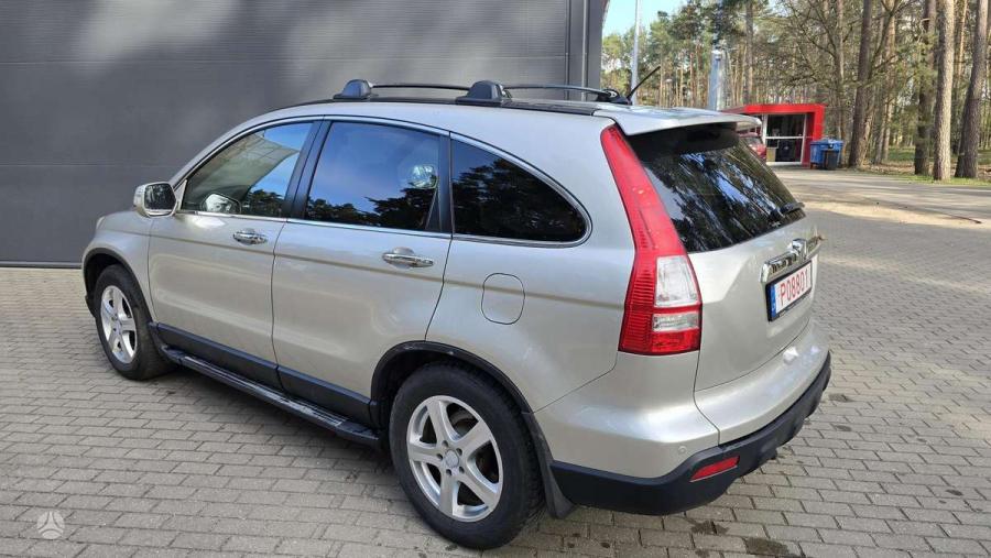 Yellow Honda CR-V 2007 in Alytus, with an engine capacity of 2.00 L and mileage of 282 thousand km for 4850 €, photo 3 on AUTOMOTO.COM.LV