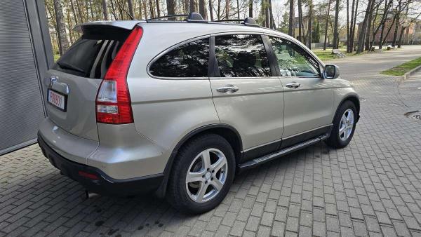 Yellow Honda CR-V 2007 in Alytus, with an engine capacity of 2.00 L and mileage of 282 thousand km for 4850 €, photo 4 on AUTOMOTO.COM.LV