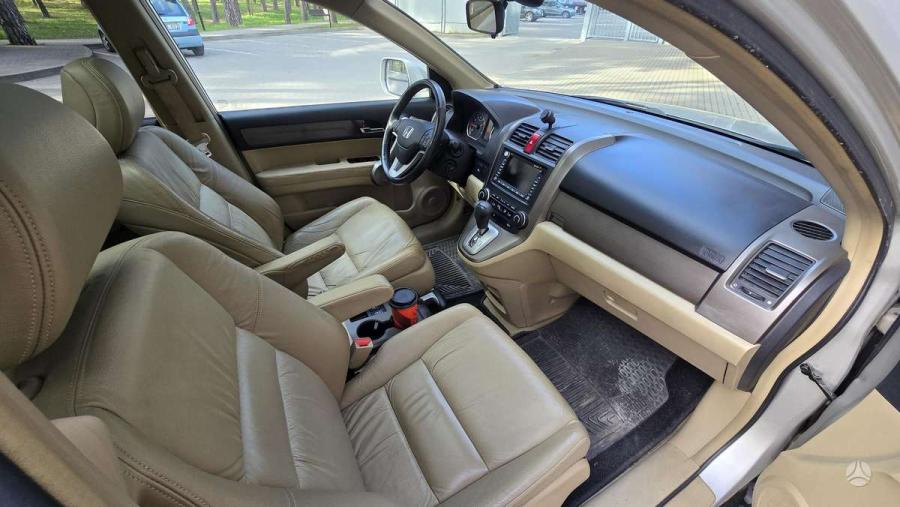 Yellow Honda CR-V 2007 in Alytus, with an engine capacity of 2.00 L and mileage of 282 thousand km for 4850 €, photo 10 on AUTOMOTO.COM.LV