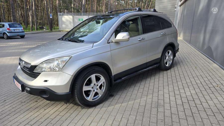 Yellow Honda CR-V 2007 in Alytus, with an engine capacity of 2.00 L and mileage of 282 thousand km for 4850 €, photo 14 on AUTOMOTO.COM.LV