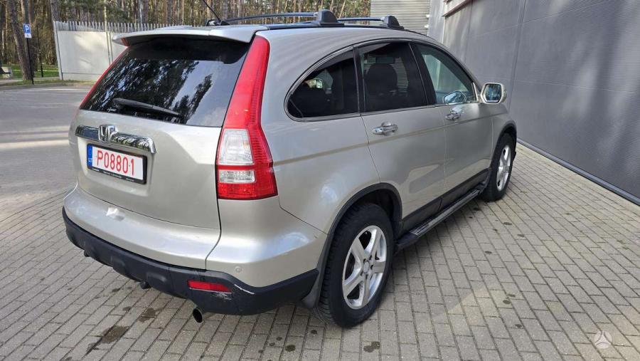 Yellow Honda CR-V 2007 in Alytus, with an engine capacity of 2.00 L and mileage of 282 thousand km for 4850 €, photo 15 on AUTOMOTO.COM.LV