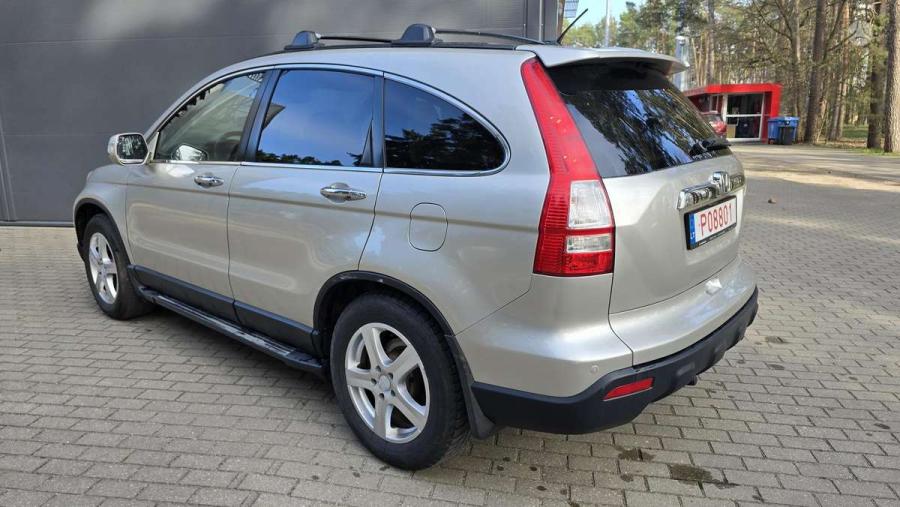 Yellow Honda CR-V 2007 in Alytus, with an engine capacity of 2.00 L and mileage of 282 thousand km for 4850 €, photo 16 on AUTOMOTO.COM.LV