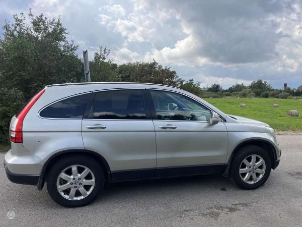 Yellow Honda CR-V 2007 in Kaisiadorys, with an engine capacity of 2.00 L and mileage of 251 thousand km for 2800 €, photo 5 on AUTOMOTO.COM.LV