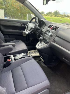 Yellow Honda CR-V 2007 in Kaisiadorys, with an engine capacity of 2.00 L and mileage of 251 thousand km for 2800 €, photo 12 on AUTOMOTO.COM.LV