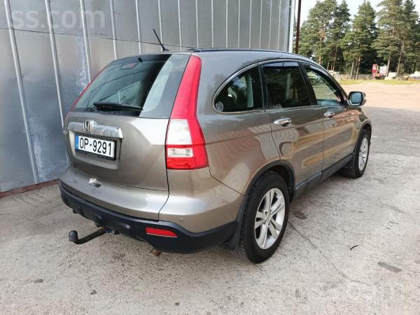 Yellow Honda CR-V 2008 in Riga, with an engine capacity of 2.20 L and mileage of 280 thousand km for 3500 €, photo 4 on AUTOMOTO.COM.LV