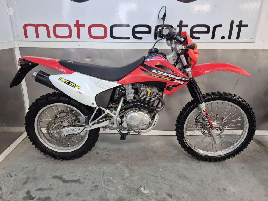 Red Honda CRF 2004 in Kaunas, with an engine capacity of 0.23 L and mileage of 0 thousand km for 2500 €, photo 3 on AUTOMOTO.COM.LV
