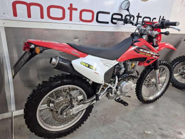 Red Honda CRF 2004 in Kaunas, with an engine capacity of 0.23 L and mileage of 0 thousand km for 2500 €, photo 3 on AUTOMOTO.COM.LV
