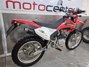 Red Honda CRF 2004 in Kaunas, with an engine capacity of 0.23 L and mileage of 0 thousand km for 2500 €, photo 4 on AUTOMOTO.COM.LV
