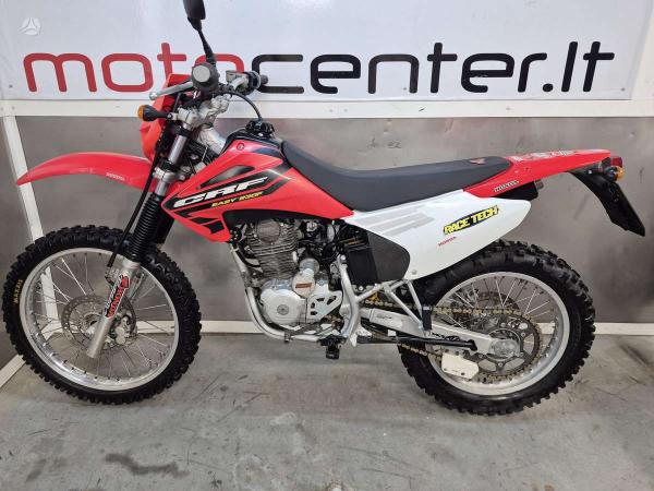 Red Honda CRF 2004 in Kaunas, with an engine capacity of 0.23 L and mileage of 0 thousand km for 2500 €, photo 5 on AUTOMOTO.COM.LV