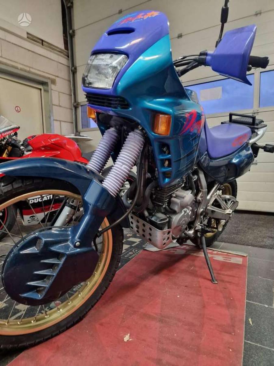 Violet Honda Dominator 1994 in Klaipeda, with an engine capacity of 0.65 L and mileage of 20 thousand km for 2100 €, photo 5 on AUTOMOTO.COM.LV