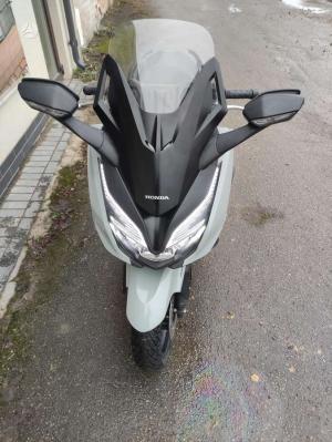 Grey Honda Forza 2022 in Panevezys, with an engine capacity of 0.13 L and mileage of 16 thousand km for 3400 €, photo 6 on AUTOMOTO.COM.LV