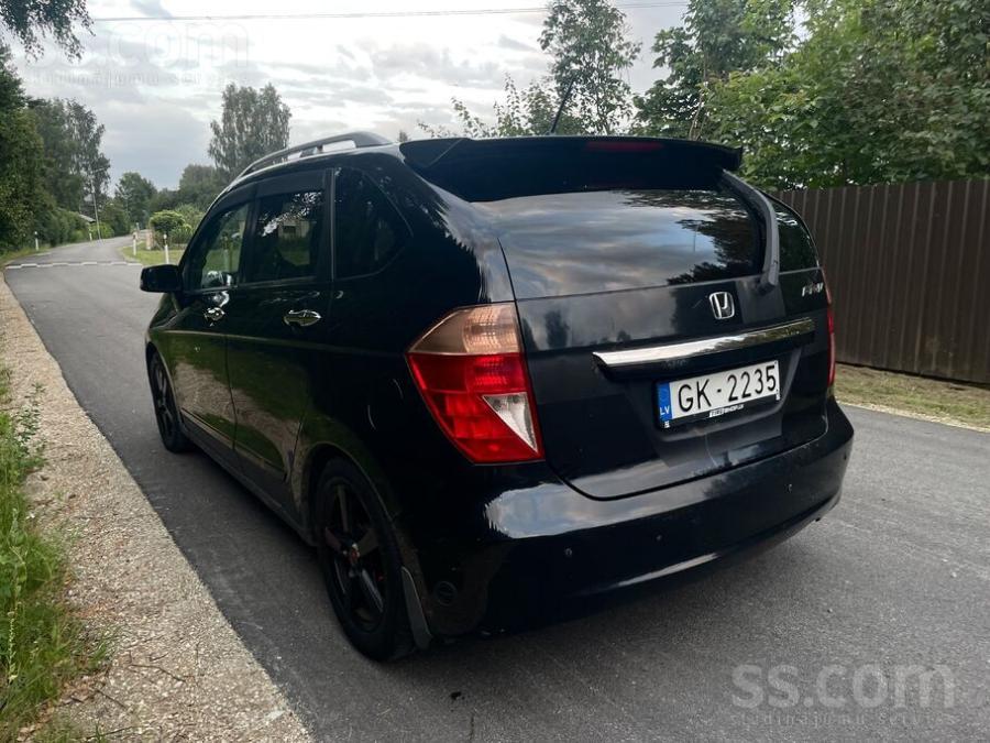 Black Honda FR-V 2007 in Riga, with an engine capacity of 1.80 L and mileage of 350 thousand km for 1990 €, photo 4 on AUTOMOTO.COM.LV