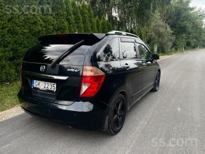 Black Honda FR-V 2007 in Riga, with an engine capacity of 1.80 L and mileage of 350 thousand km for 1990 €, photo 5 on AUTOMOTO.COM.LV