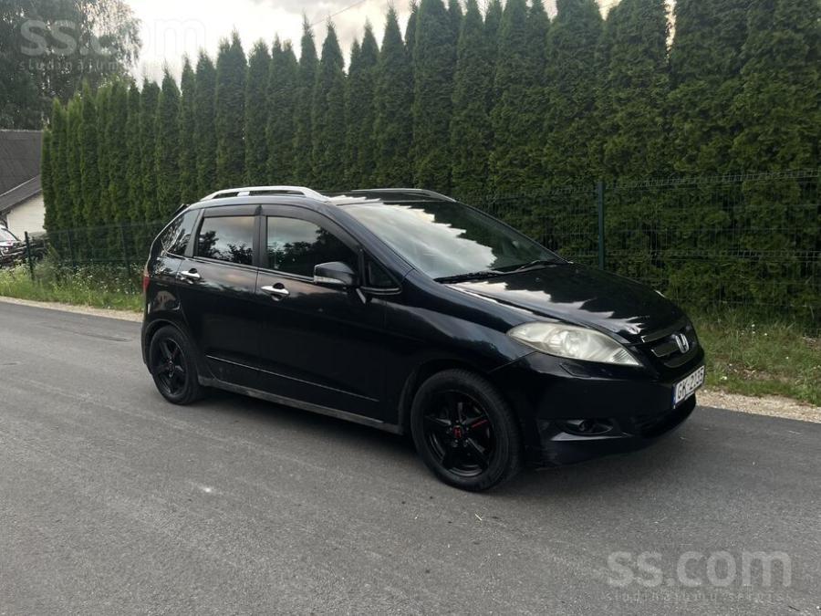 Black Honda FR-V 2007 in Riga, with an engine capacity of 1.80 L and mileage of 350 thousand km for 1990 €, photo 6 on AUTOMOTO.COM.LV
