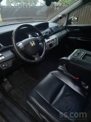Black Honda FR-V 2007 in Riga, with an engine capacity of 1.80 L and mileage of 350 thousand km for 1990 €, photo 7 on AUTOMOTO.COM.LV