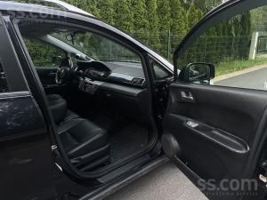Black Honda FR-V 2007 in Riga, with an engine capacity of 1.80 L and mileage of 350 thousand km for 1990 €, photo 10 on AUTOMOTO.COM.LV