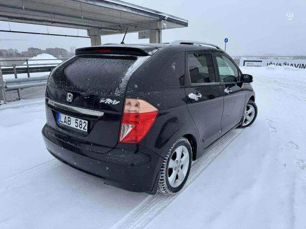 Black Honda FR-V 2008 in Vilnius, with an engine capacity of 1.80 L and mileage of 200 thousand km for 2950 €, photo 7 on AUTOMOTO.COM.LV