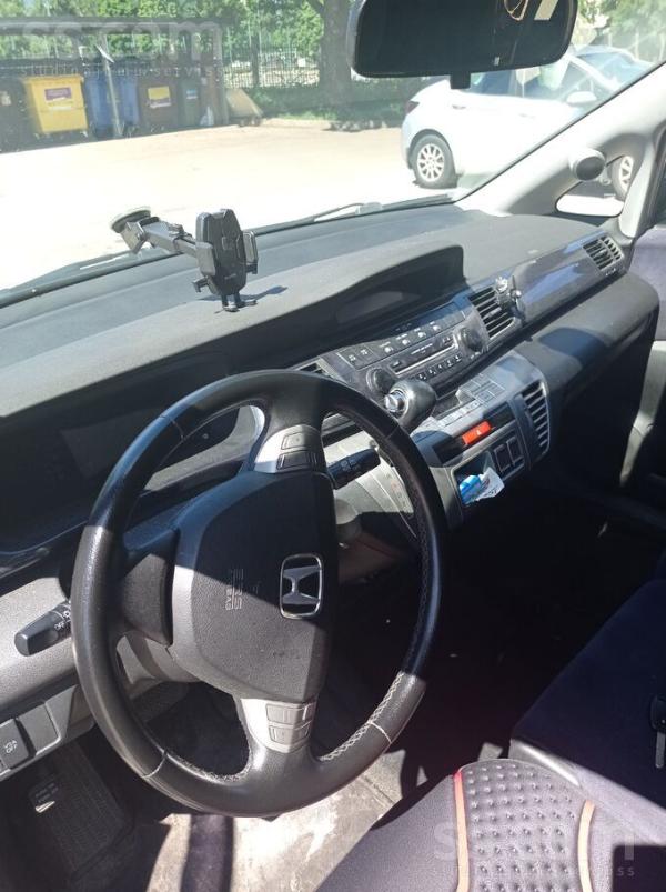 Black Honda FR-V 2008 in Riga, with an engine capacity of 1.80 L and mileage of 270 thousand km for 1200 €, photo 1 on AUTOMOTO.COM.LV