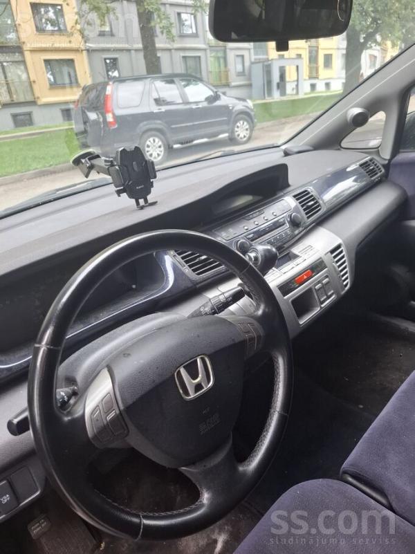 Melns Honda FR-V 2008 Rīga, ar dzinēja tilpumu 1.80 L un nobraukumu 270 tūkst. km par 1200 €, foto 3 vietnē AUTOMOTO.COM.LV