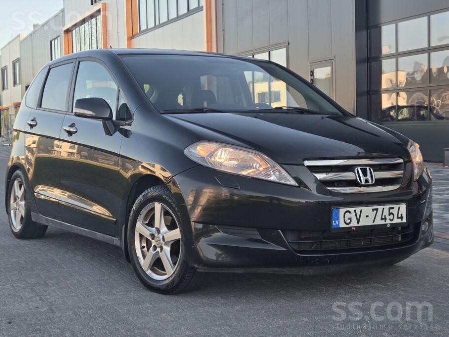 Black Honda FR-V 2008 in Riga, with an engine capacity of 1.80 L and mileage of 311 thousand km for 2290 €, photo 1 on AUTOMOTO.COM.LV