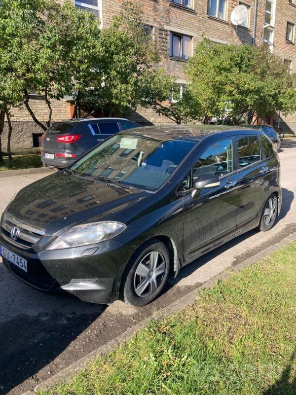 Black Honda FR-V 2007 in Riga, with an engine capacity of 1.80 L and mileage of 317 thousand km for 1200 €, photo 1 on AUTOMOTO.COM.LV