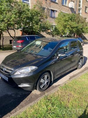 Melns Honda FR-V 2007 Rīga, ar dzinēja tilpumu 1.80 L un nobraukumu 317 tūkst. km par 1200 €, foto  vietnē AUTOMOTO.COM.LV