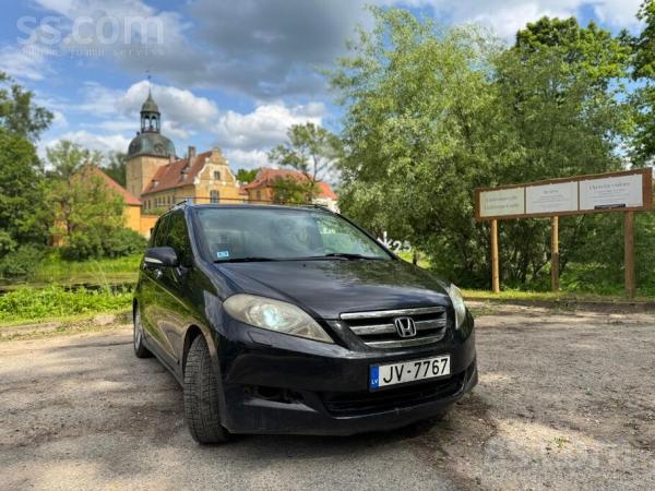 Black Honda FR-V 2008 in Cesis, with an engine capacity of 2.20 L and mileage of 249 thousand km for 1500 €, photo 1 on AUTOMOTO.COM.LV