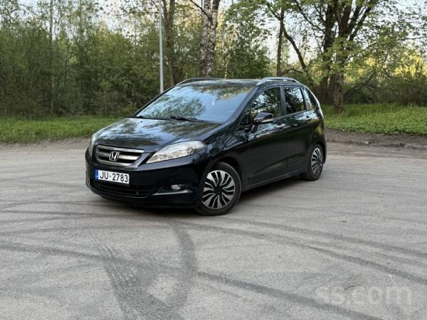 Black Honda FR-V 2009 in Riga, with an engine capacity of 2.20 L and mileage of 234 thousand km for 2090 €, photo 1 on AUTOMOTO.COM.LV