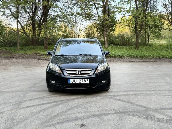 Black Honda FR-V 2009 in Riga, with an engine capacity of 2.20 L and mileage of 234 thousand km for 2090 €, photo 3 on AUTOMOTO.COM.LV