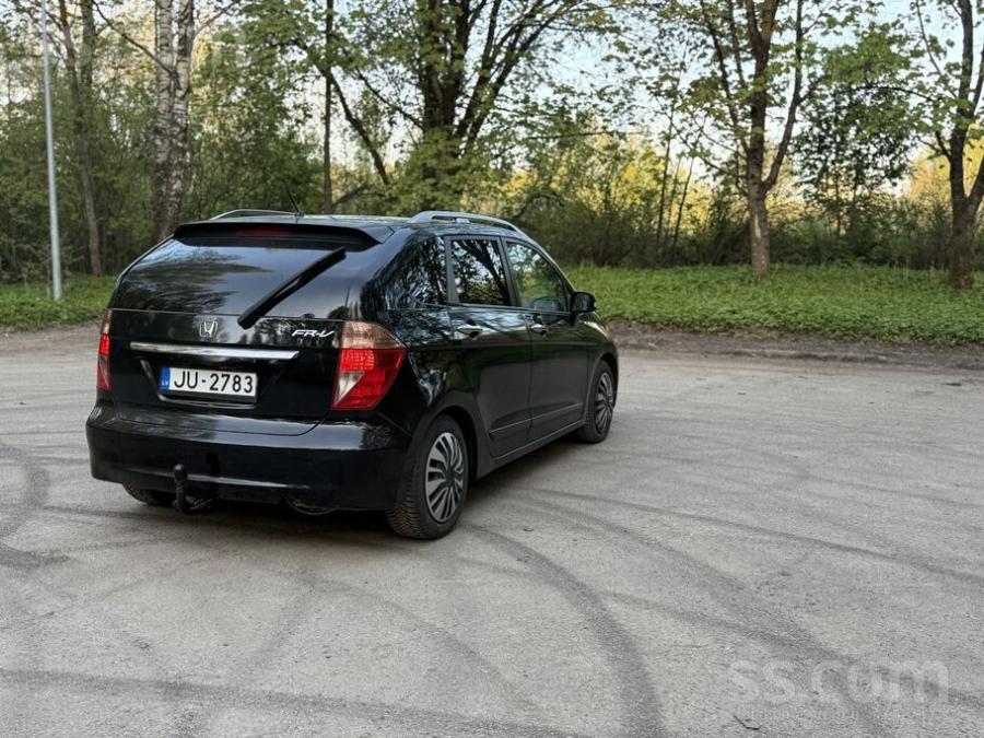 Black Honda FR-V 2009 in Riga, with an engine capacity of 2.20 L and mileage of 234 thousand km for 2090 €, photo 4 on AUTOMOTO.COM.LV
