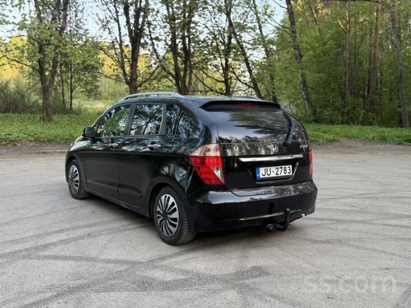 Black Honda FR-V 2009 in Riga, with an engine capacity of 2.20 L and mileage of 234 thousand km for 2090 €, photo 5 on AUTOMOTO.COM.LV