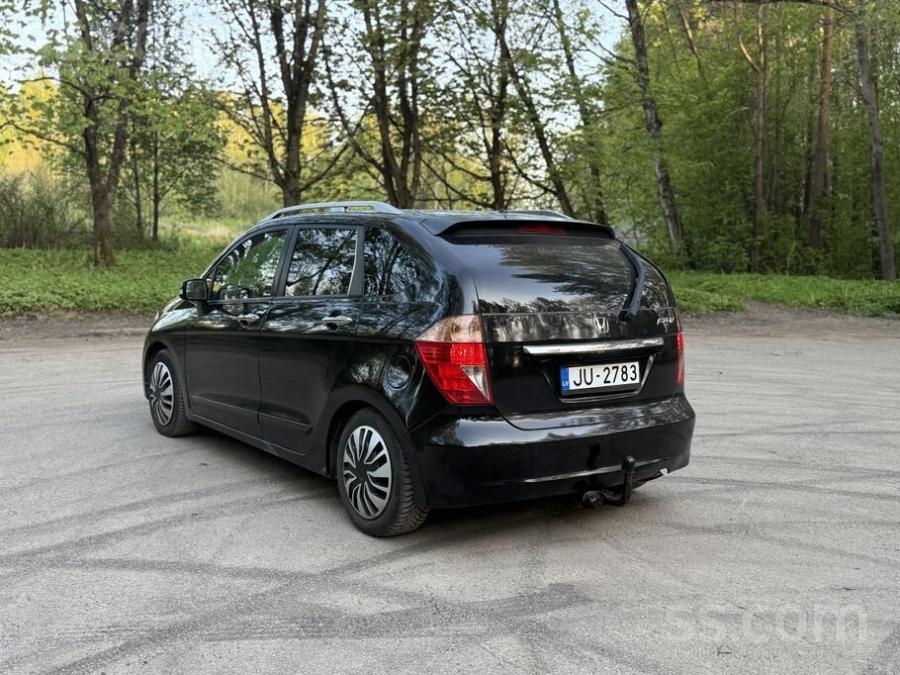 Black Honda FR-V 2009 in Riga, with an engine capacity of 2.20 L and mileage of 234 thousand km for 2090 €, photo 5 on AUTOMOTO.COM.LV