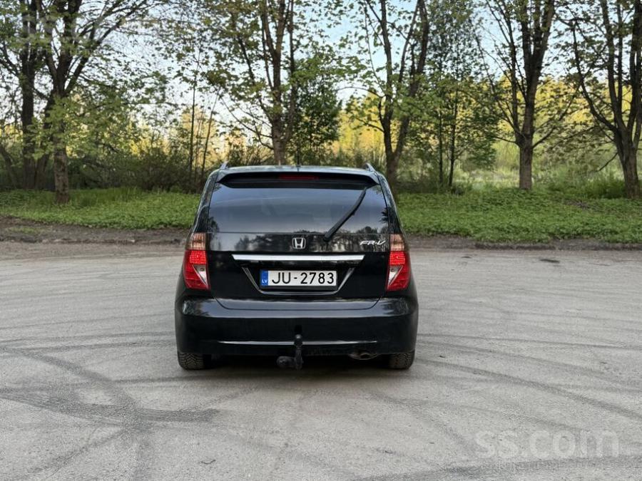 Black Honda FR-V 2009 in Riga, with an engine capacity of 2.20 L and mileage of 234 thousand km for 2090 €, photo 6 on AUTOMOTO.COM.LV