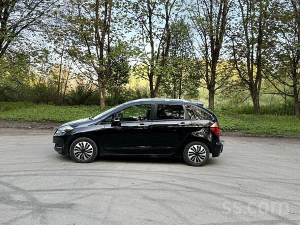 Black Honda FR-V 2009 in Riga, with an engine capacity of 2.20 L and mileage of 234 thousand km for 2090 €, photo 7 on AUTOMOTO.COM.LV