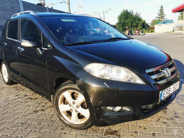 Black Honda FR-V 2009 in Vilnius, with an engine capacity of 1.80 L and mileage of 165 thousand km for 3550 €, photo 5 on AUTOMOTO.COM.LV